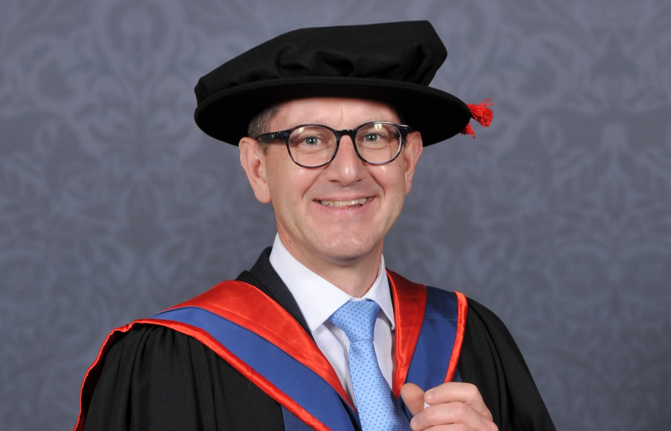 Salford professor receives Alumni Award in recognition of charity work ...